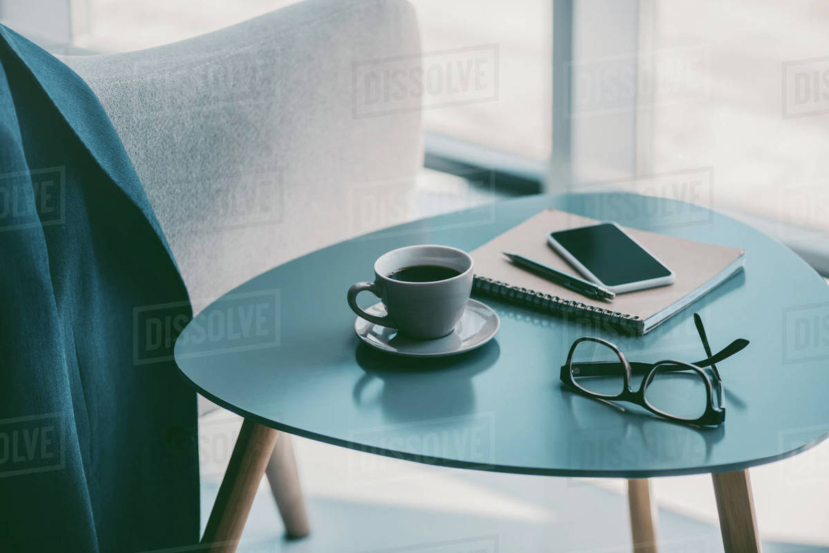 Still-life with coffee, smartphone, notepad and eyeglasses - Royalty ...