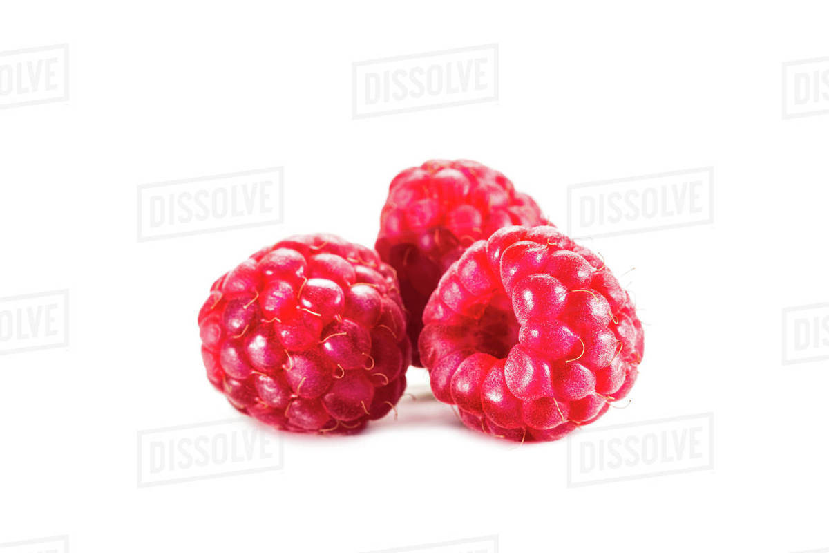 Pile of fresh ripe raspberries isolated on white background - Royalty ...