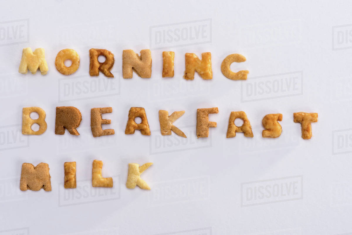 Close-up view of words morning, breakfast, milk from alphabet corn ...