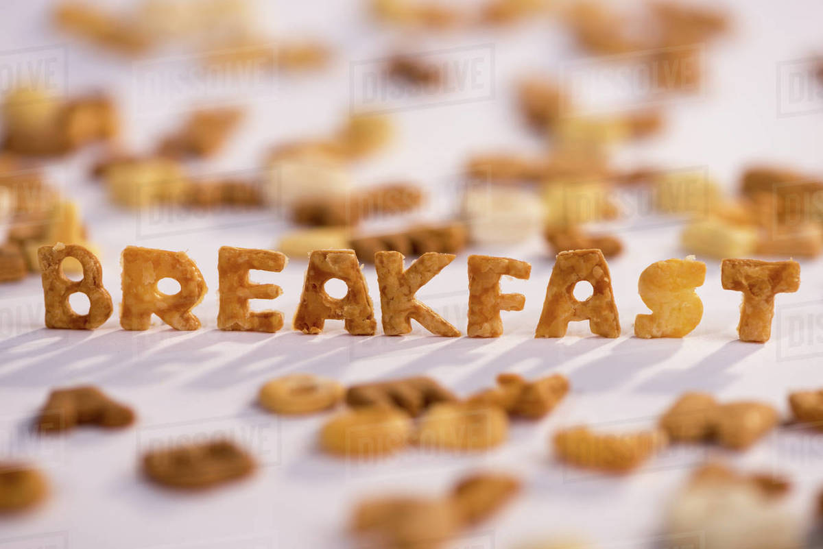 Close-up view of word breakfast and healthy breakfast cereal alphabet ...