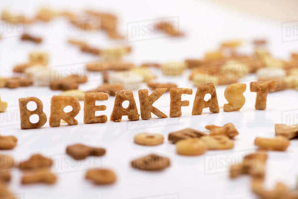 Close-up view of word breakfast and healthy breakfast cereal alphabet ...