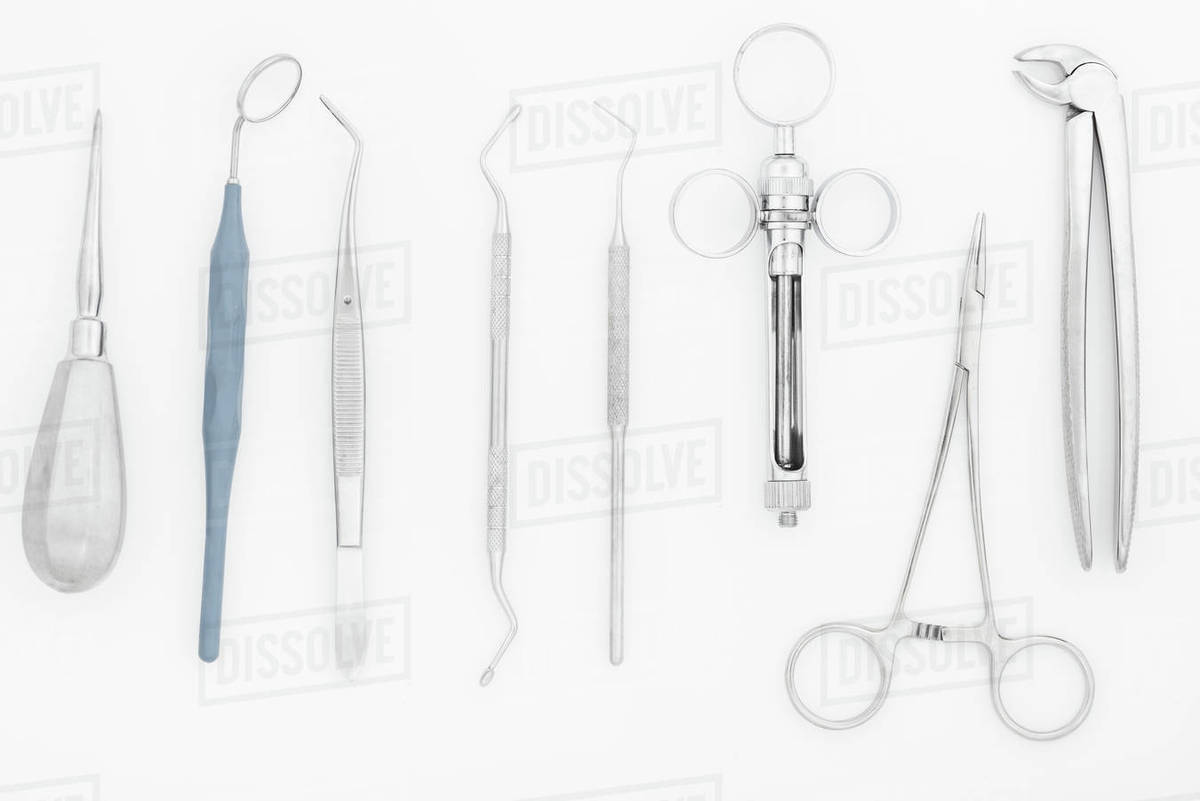 Top view of dental mirror and professional dental instruments isolated ...