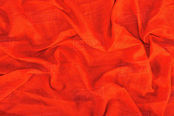 close up view of red linen fabric texture - Stock Photo - Dissolve
