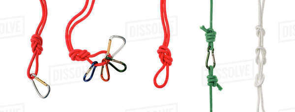 Various ropes with knots, loops and carabiners isolated on white ...