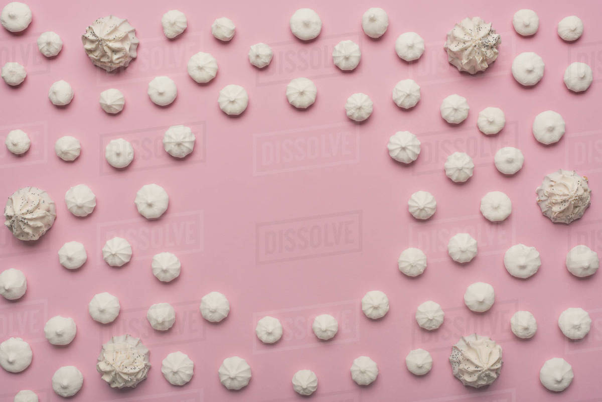 Circle frame made of white marshmallows, isolated on pink - Stock Photo ...