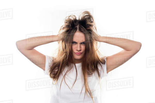 Girl with wild hair in the morning isolated on white - Royalty-free ...