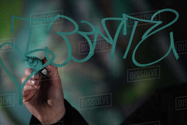 Cropped view of man writing graffiti with marker - Royalty-free Stock ...