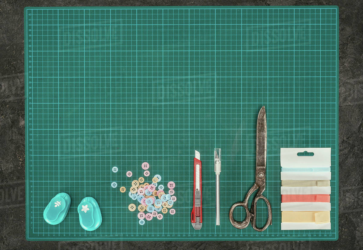Top view of scale with tools for scrapbooking on gray surface - Stock ...