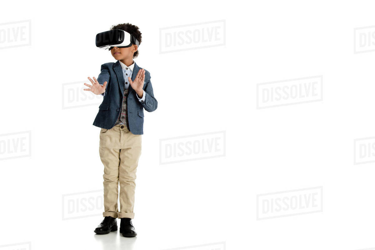 Adorable african american child touching something with virtual reality ...