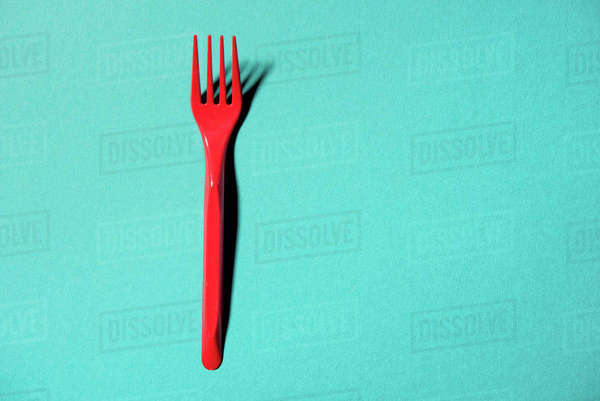 Top view of red plastic fork isolated on blue - Royalty-free Stock ...