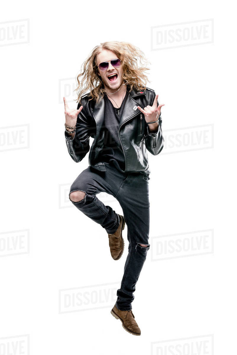 Portrait of handsome rocker in black leather jacket and sunglasses ...