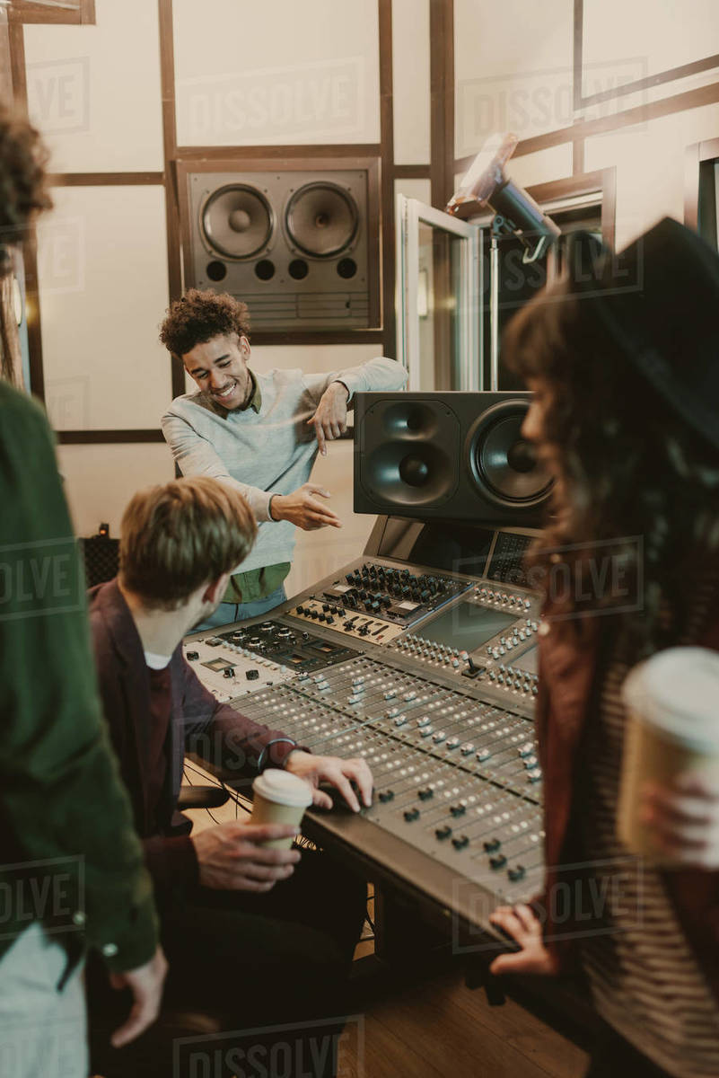 happy music band spending time at recording studio - Royalty-free Stock ...