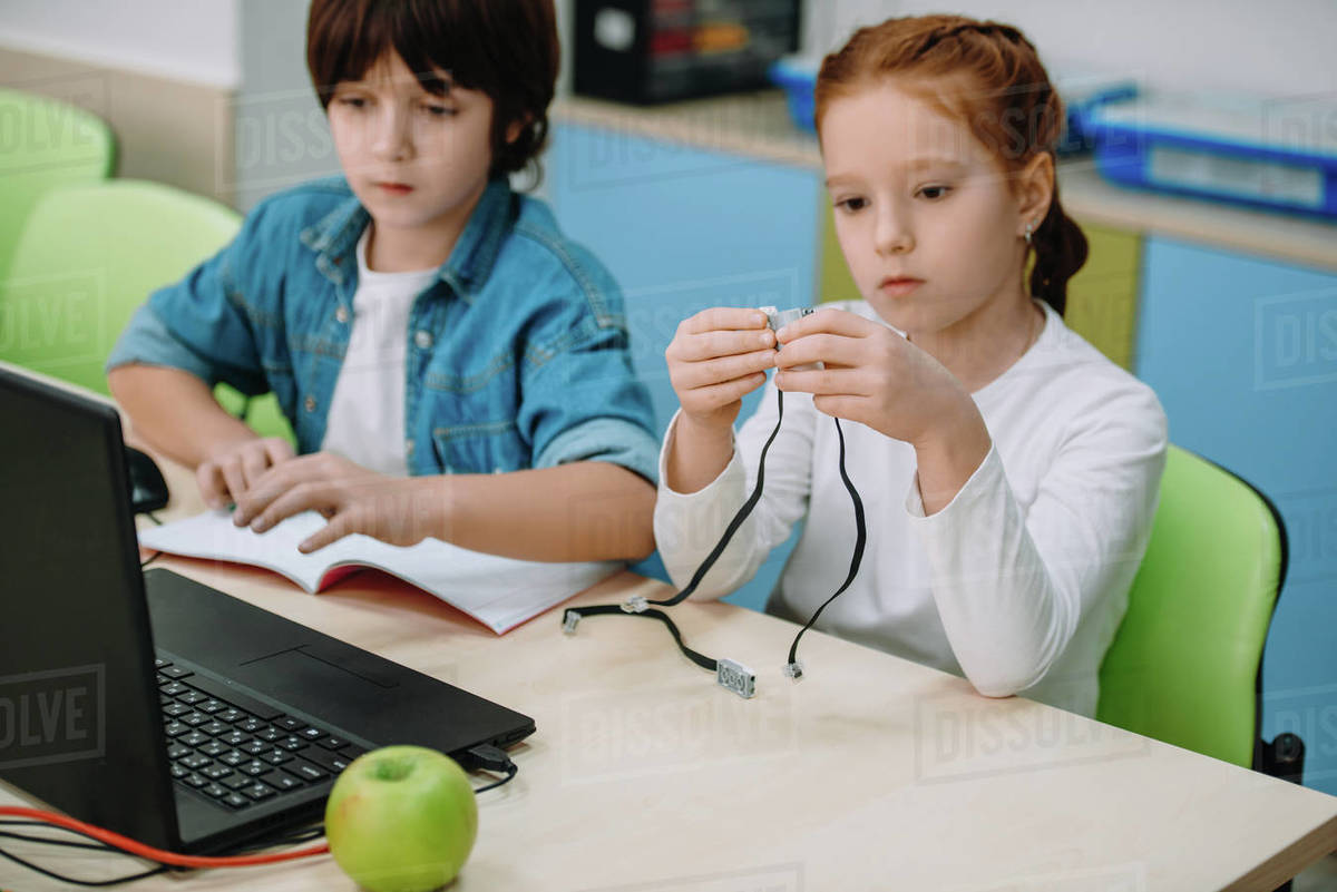 kids constructing project together, stem education concept - Royalty ...