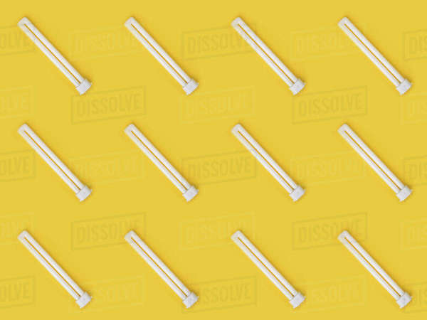 full frame of arrangement of light bulbs isolated on yellow - Stock ...