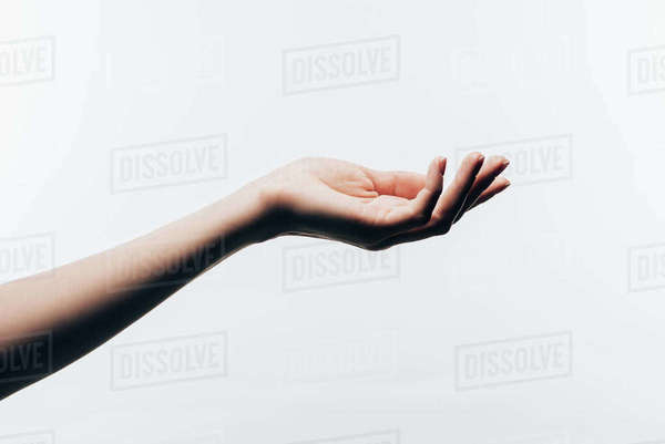 Cropped shot of female hand with perfect skin isolated on white ...