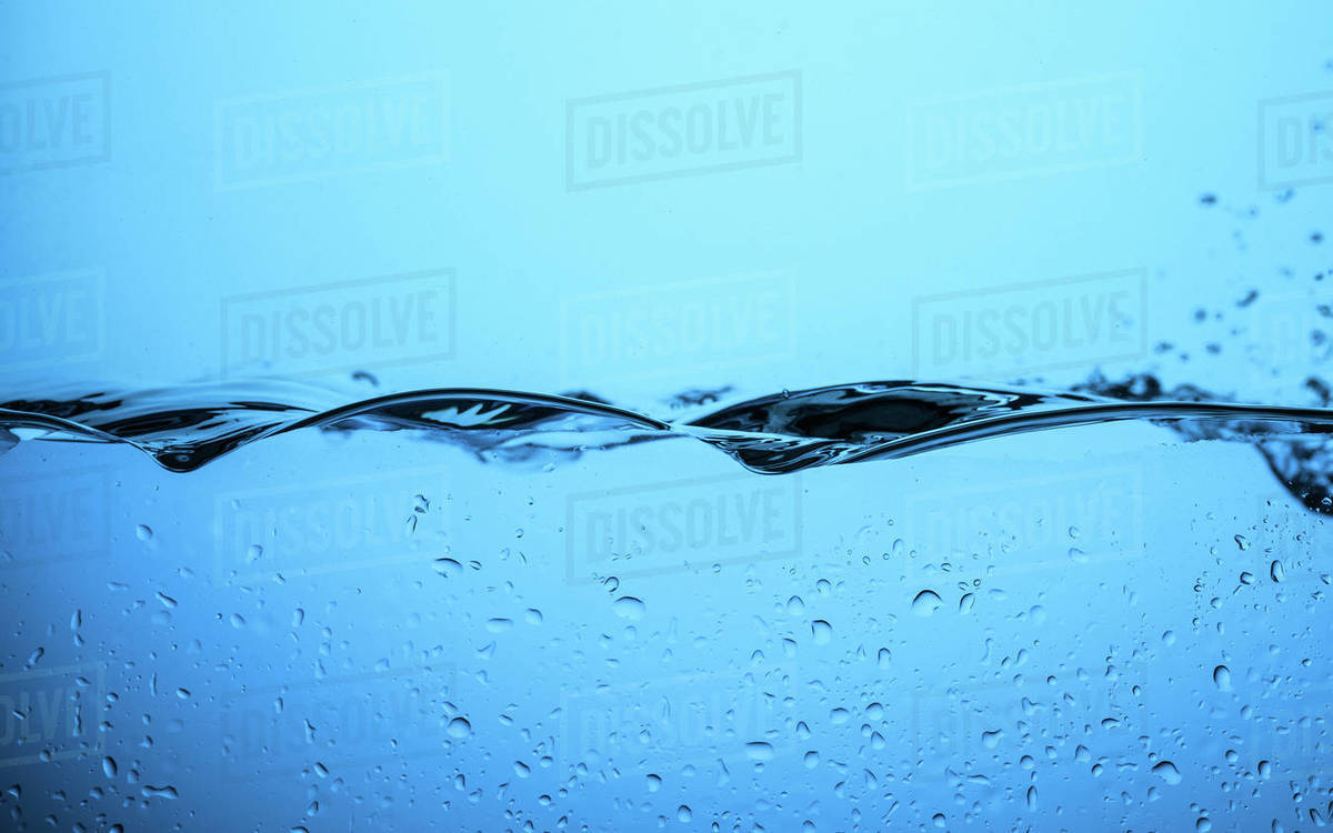 Flowing water texture with drops, isolated on blue - Royalty-free Stock ...