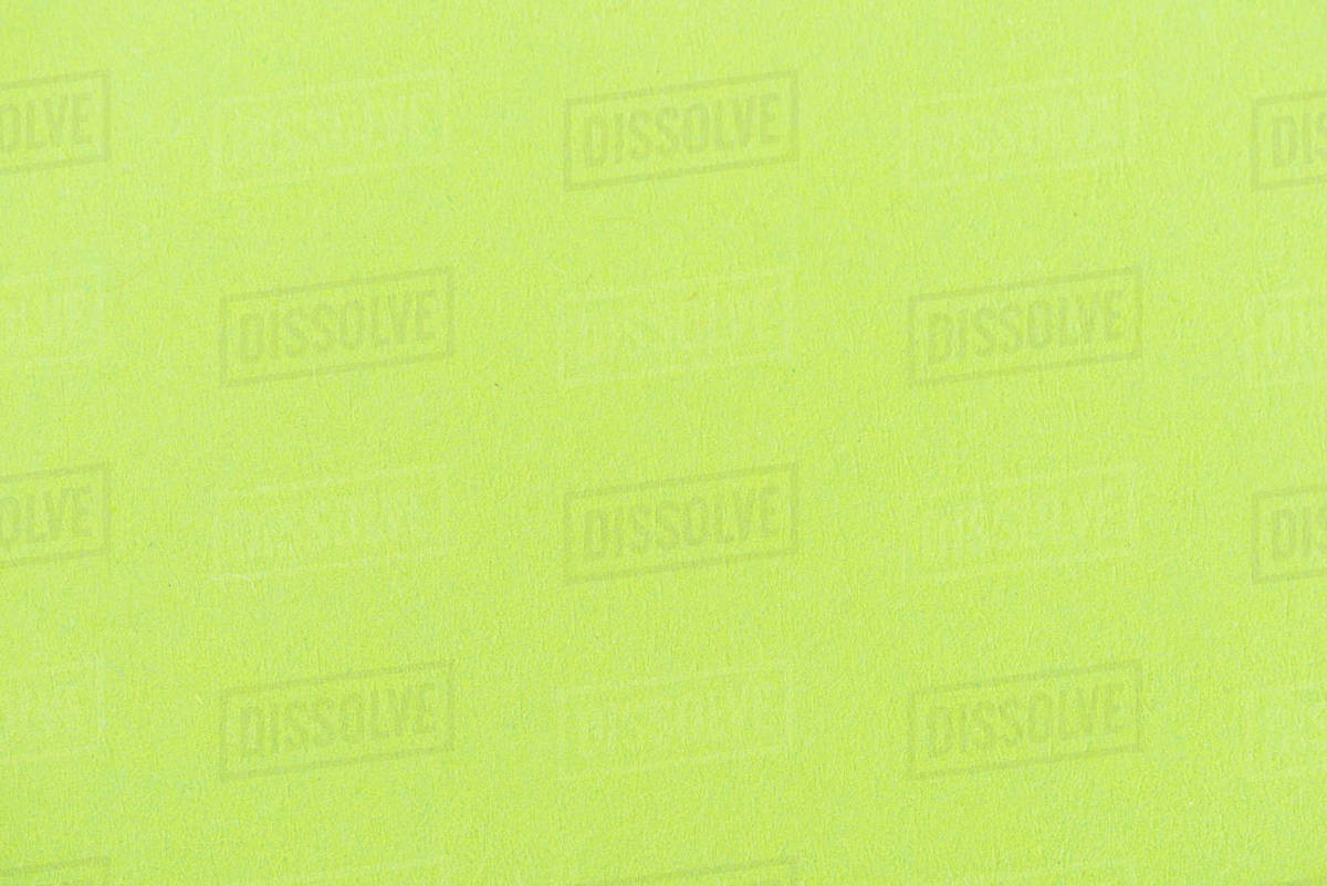 Texture of pale green color paper as background - Stock Photo - Dissolve