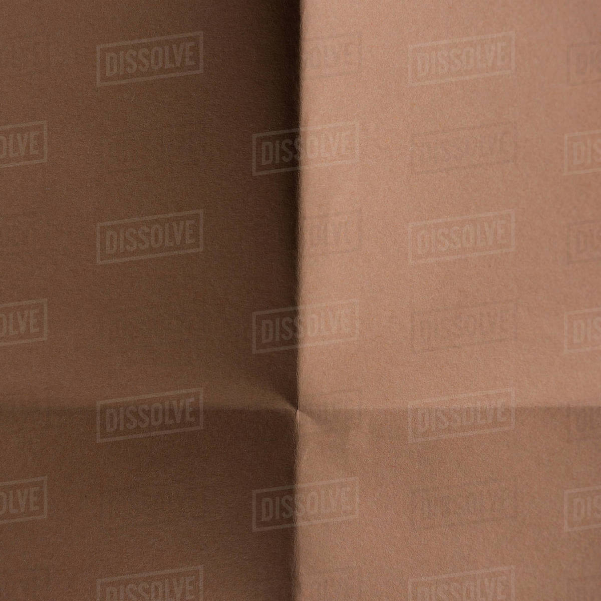 Close-up shot of brown colored folded paper for background - Stock ...