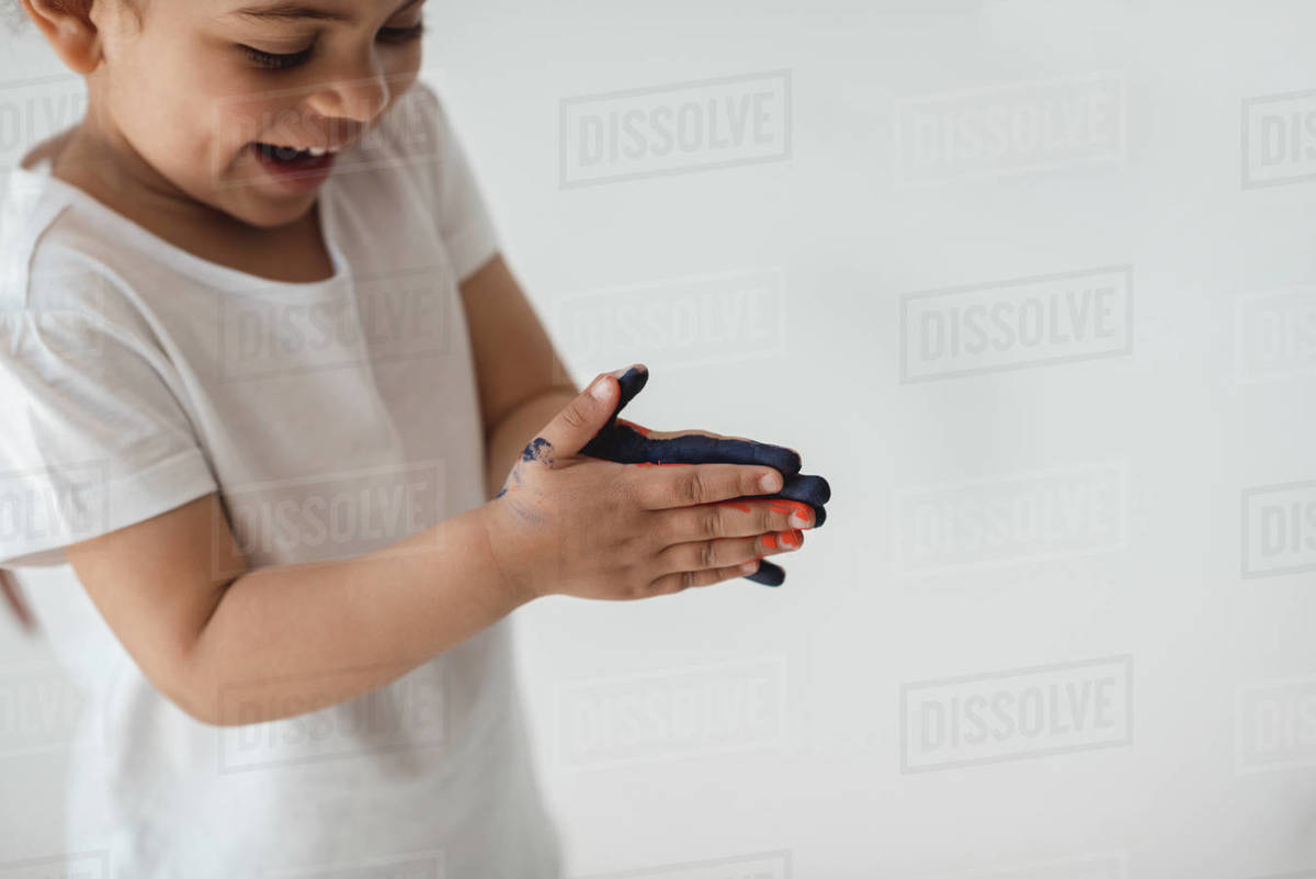 Cute little kid girl with painted hands isolated on white - Stock Photo ...