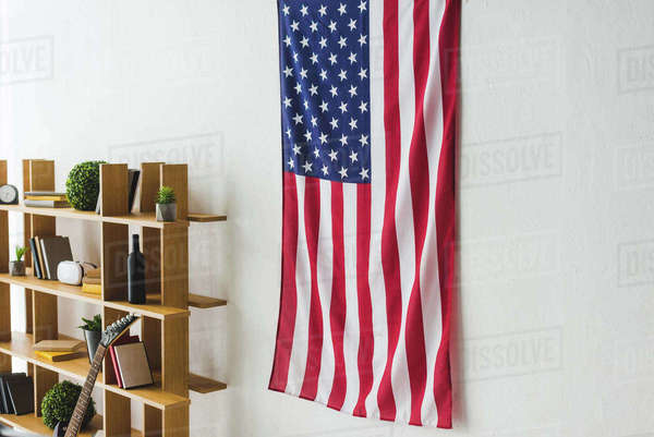 American flag hanging on wall inside living room - Royalty-free Stock ...