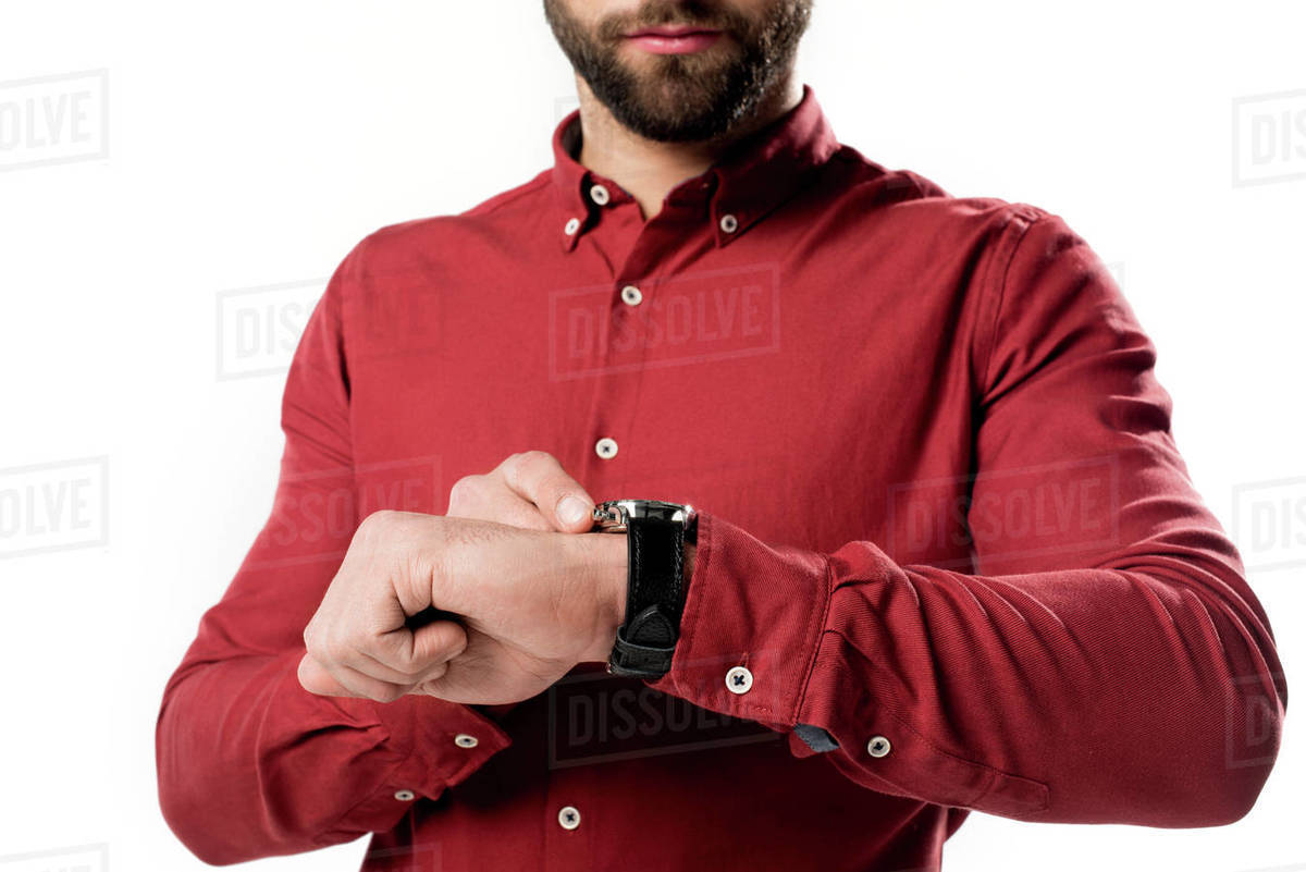 Cropped shot of man checking time isolated on white - Stock Photo ...