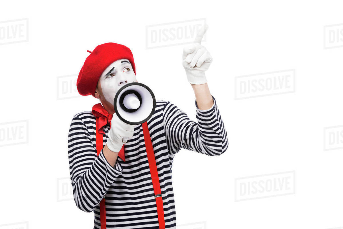 Mime speaking in megaphone and pointing up isolated on white - Stock ...