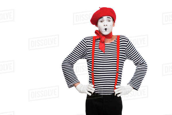 Surprised mime standing with hands akimbo isolated on white - Royalty ...