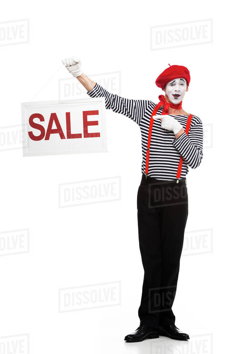 Happy mime pointing on sale signboard isolated on white - Royalty-free ...
