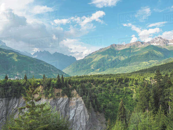 Beautiful landscape with scenic mountains and green vegetation on ...