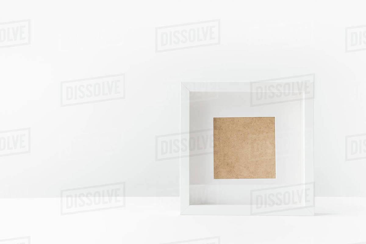 Close-up view of empty white photo frame on white - Royalty-free Stock ...