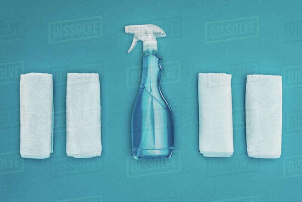 Top view of rags and spray bottle isolated on blue - Royalty-free Stock ...