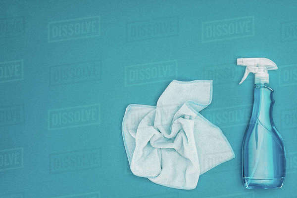 Top view of rag and spray bottle isolated on blue - Royalty-free Stock ...