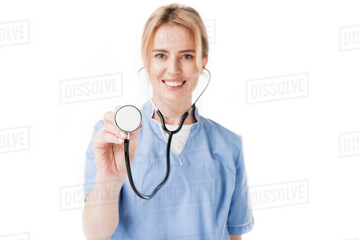Young nurse using stethoscope isolated on white - Royalty-free Stock ...
