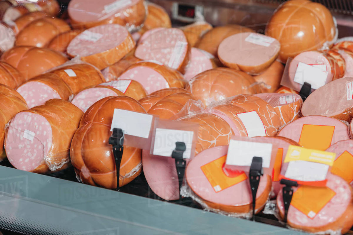 Close up view of arranged sausages and wurst in supermarket - Royalty ...