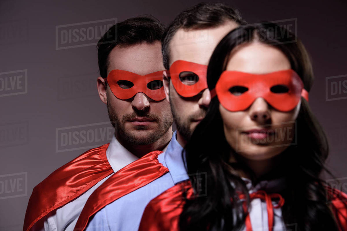 Super businesspeople in masks and capes standing in line isolated on ...
