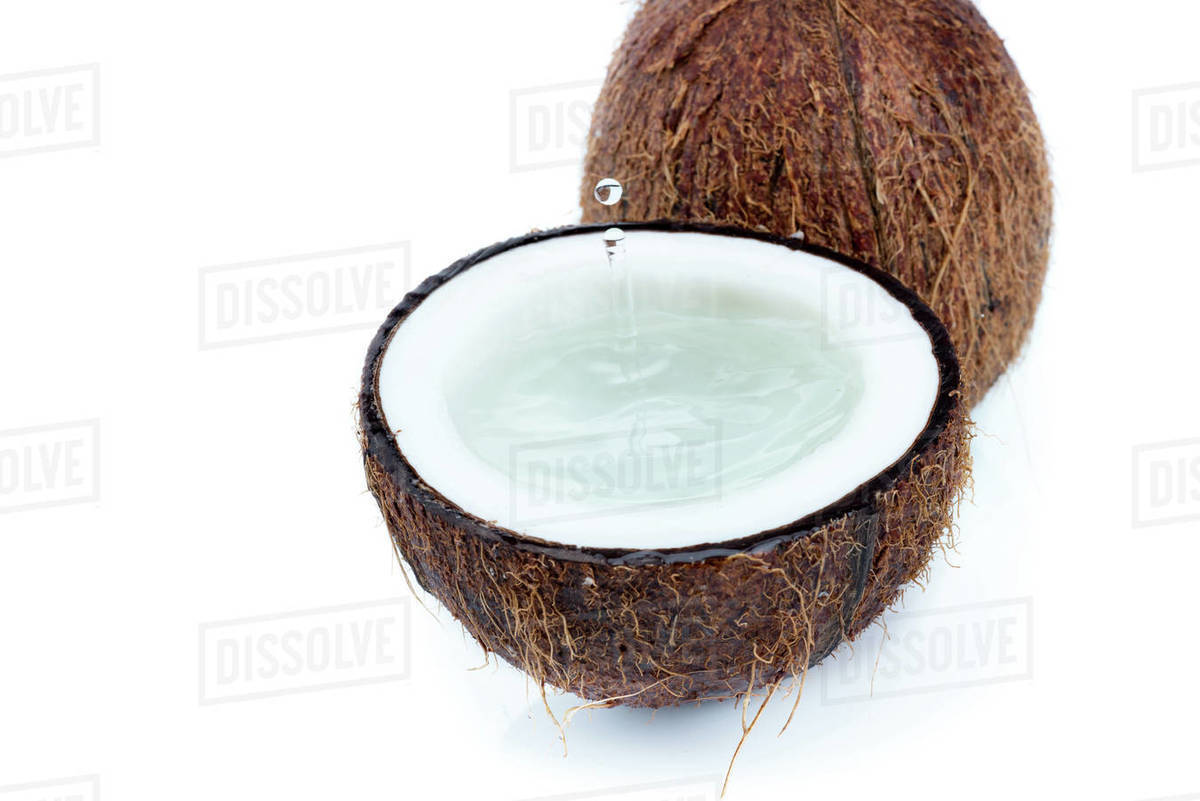 Fresh ripe tropical coconuts with water isolated on white, coconut ...