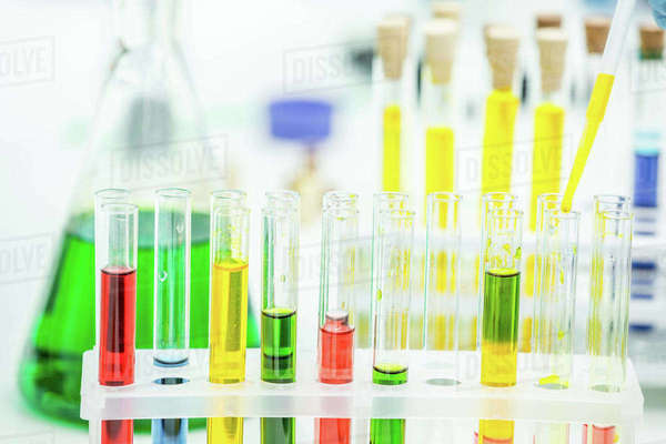 Close-up view of test tubes with reagents in chemical laboratory ...