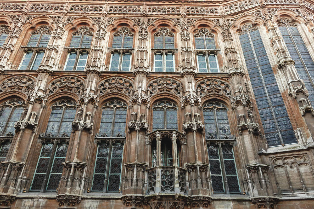 Low angle view of beautiful gothic architecture of historical building ...