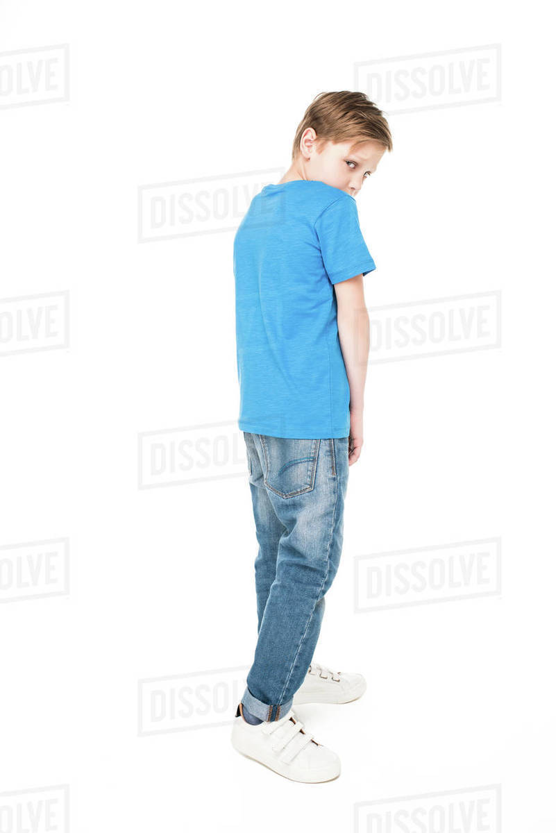 Full length view of scared little boy looking at camera isolated on ...