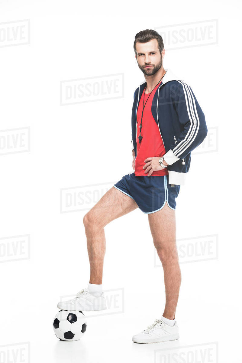 Football trainer with ball, isolated on white - Stock Photo - Dissolve