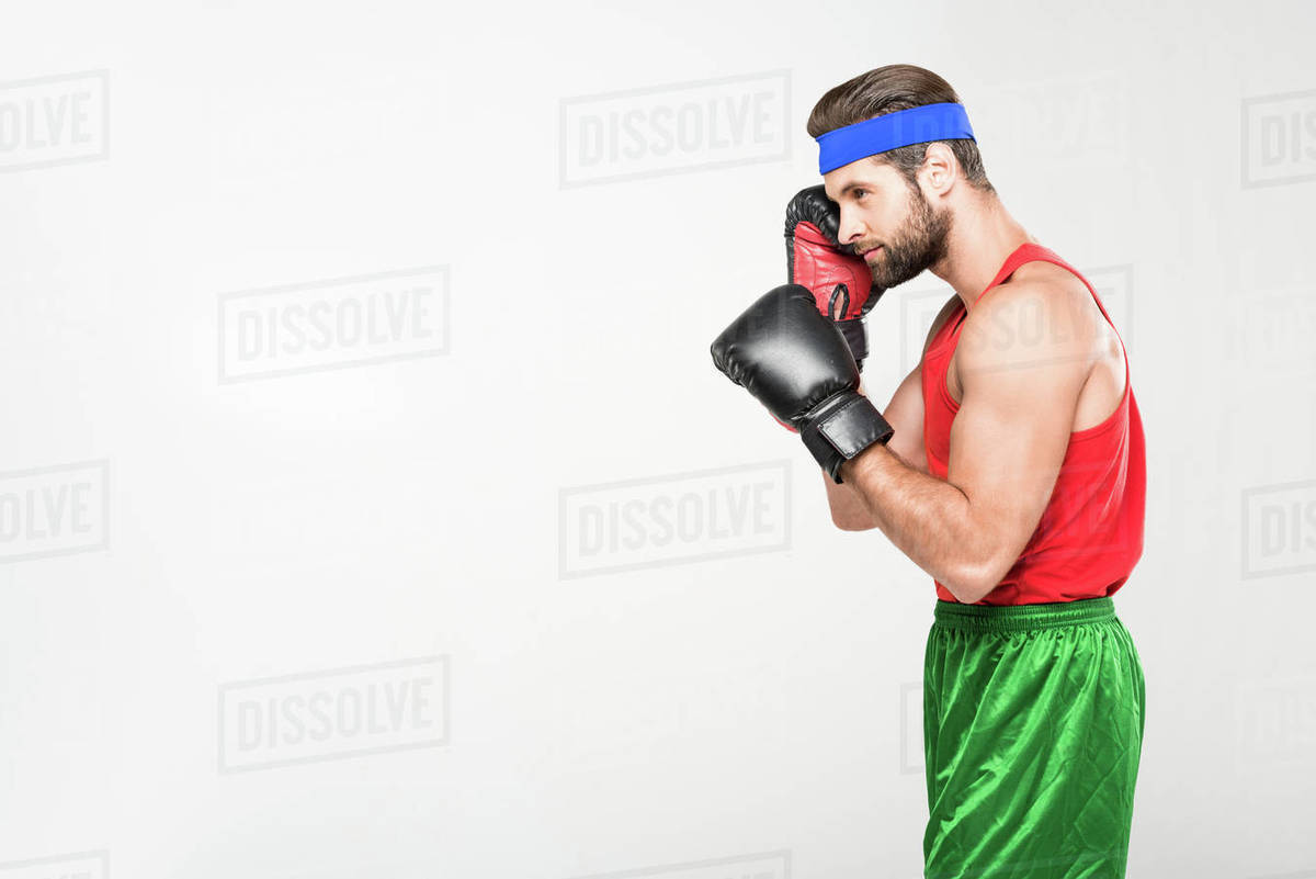 Retro boxer in boxing gloves, isolated on white - Stock Photo - Dissolve