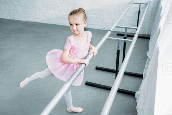 High angle view of adorable child practicing ballet in studio - Royalty ...
