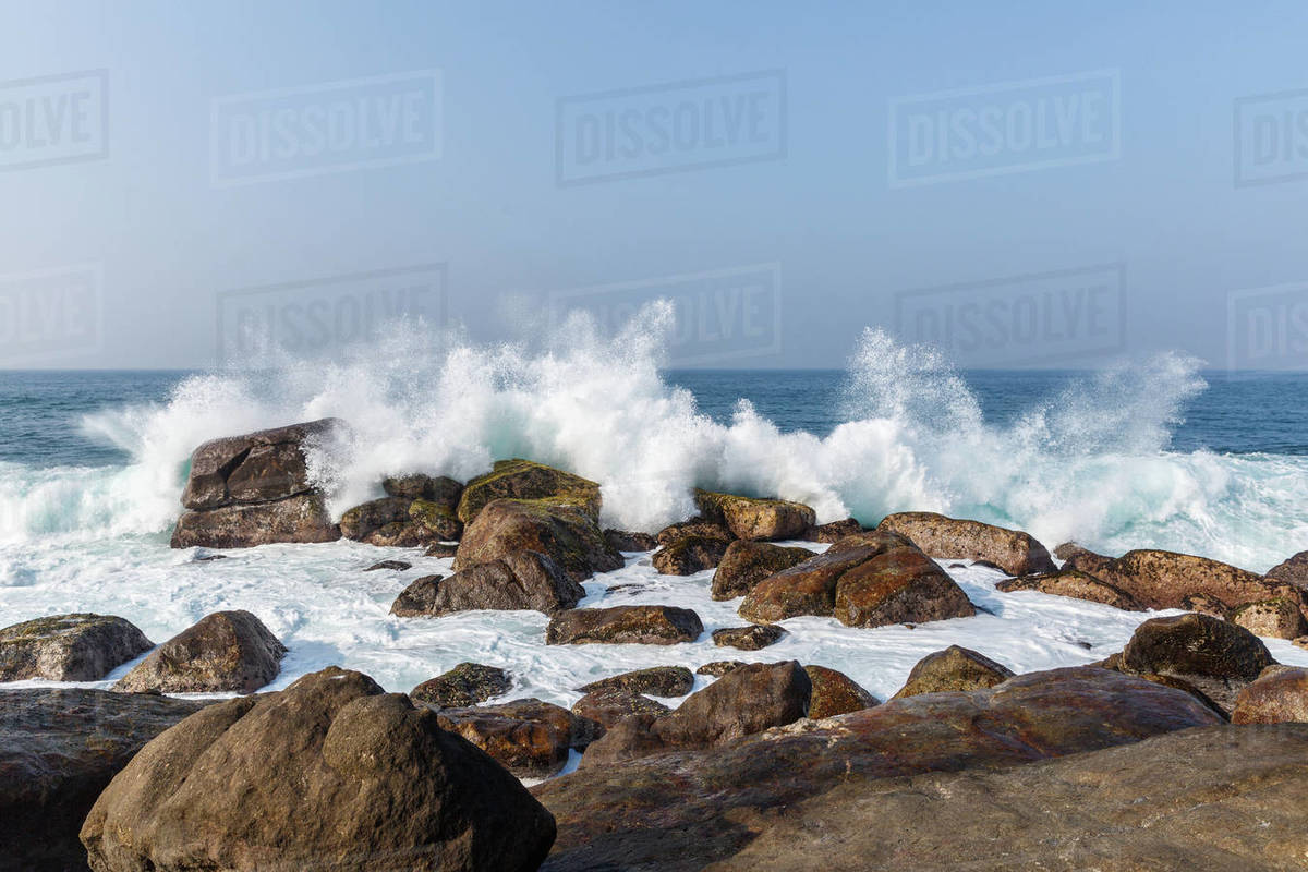Scenic view of ocean waves washing into rocks, sri lanka, mirissa ...