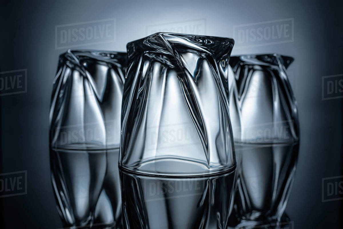 transparent empty glassware on grey with reflections - Royalty-free ...