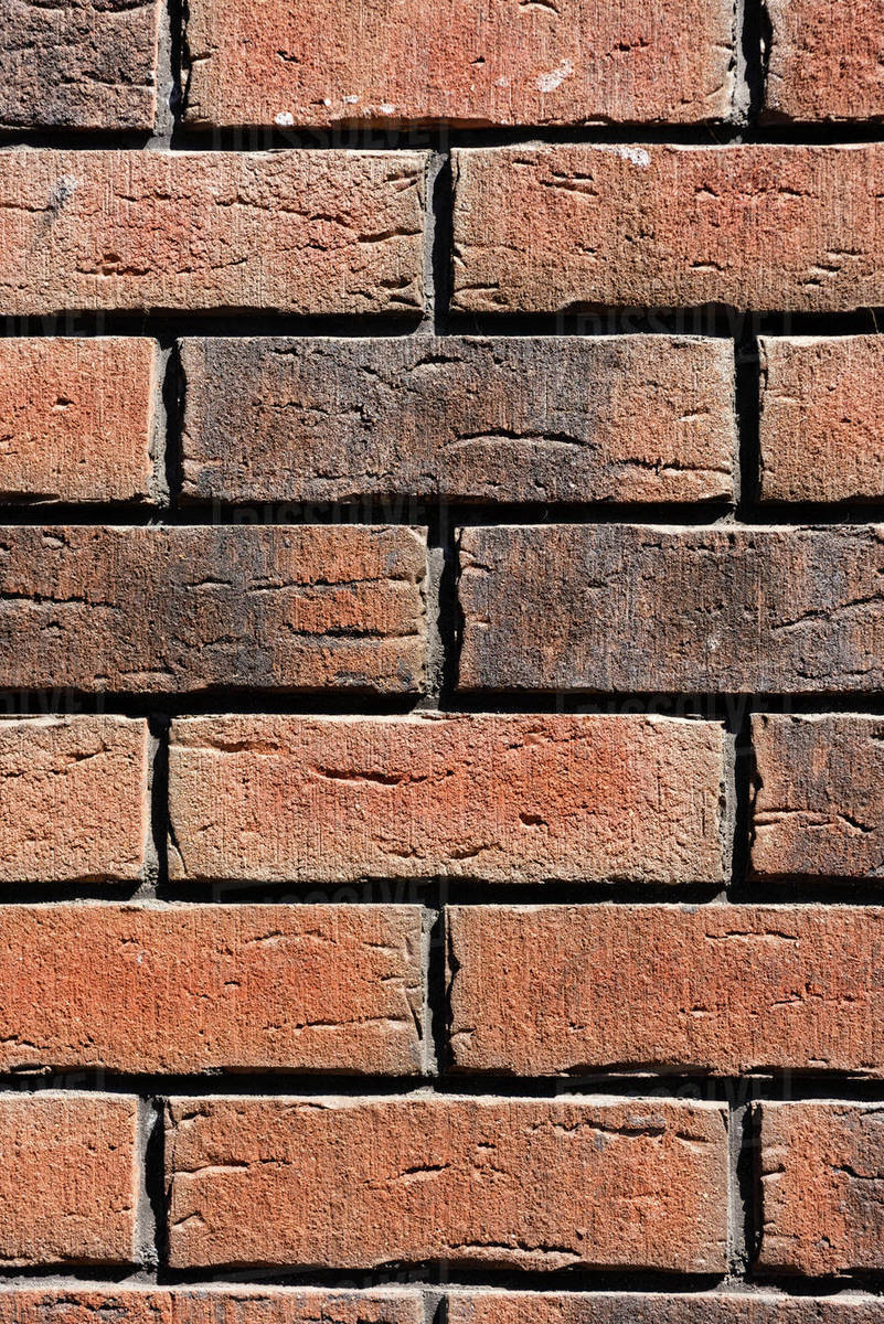 Close-up view of brown weathered brick wall background - Stock Photo ...