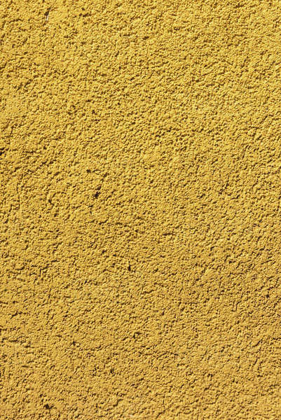 Close-up view of yellow rough wall textured background - Stock Photo ...