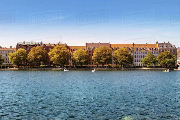 COPENHAGEN, DENMARK - MAY 6, 2018: scenic view of cityscape, trees and ...