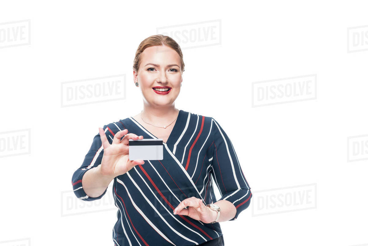 Happy attractive businesswoman showing credit card isolated on white ...