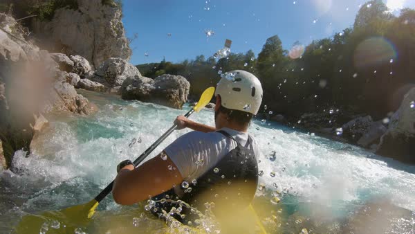 A man kayaking through rapids, filmed in slow motion - Stock Video ...