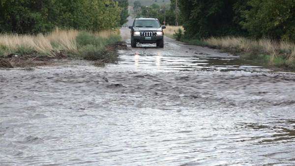 Flash flood across road vehicle stuck. Monsoon flash flood water thick ...